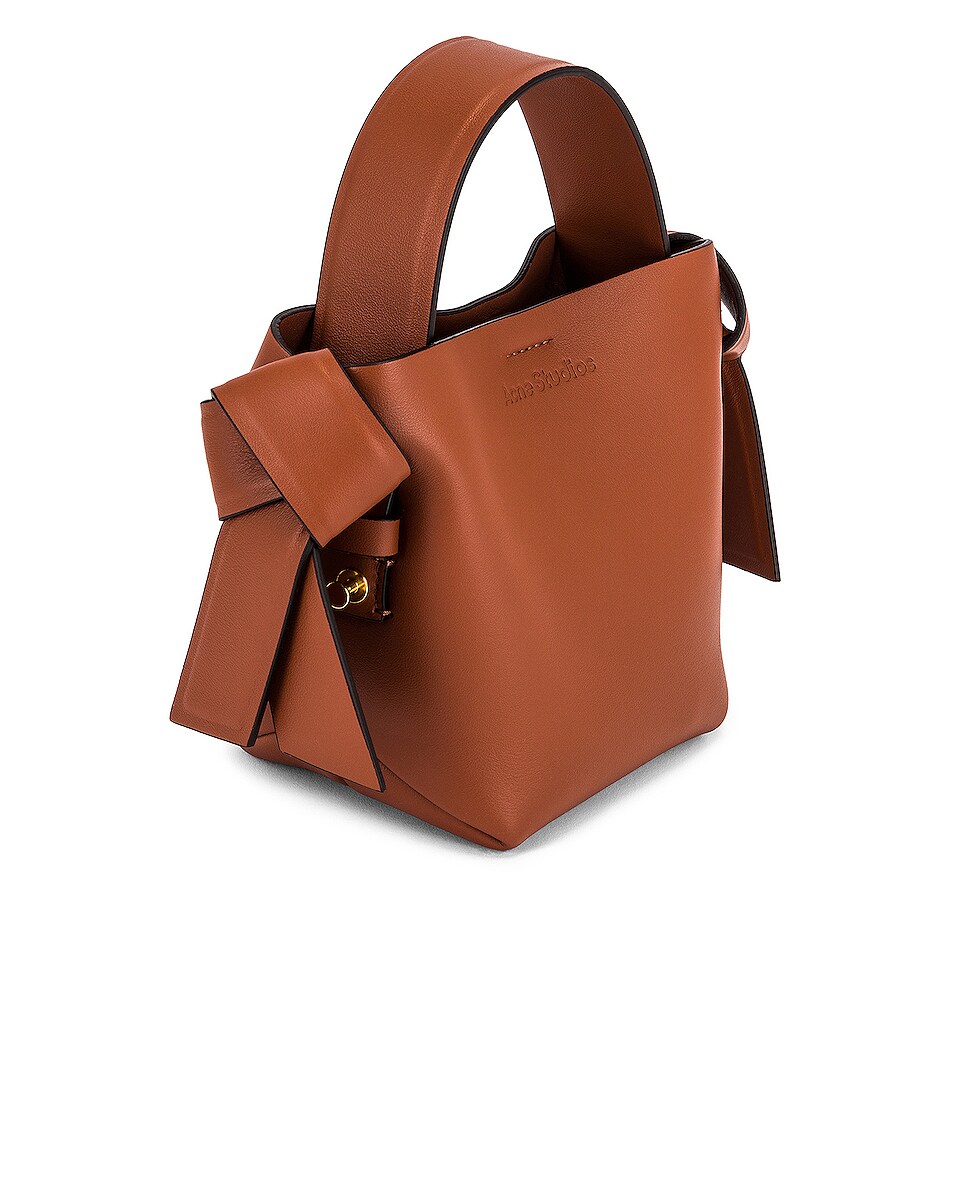Acne Studios Micro Musubi Bag in Almond Brown | FWRD