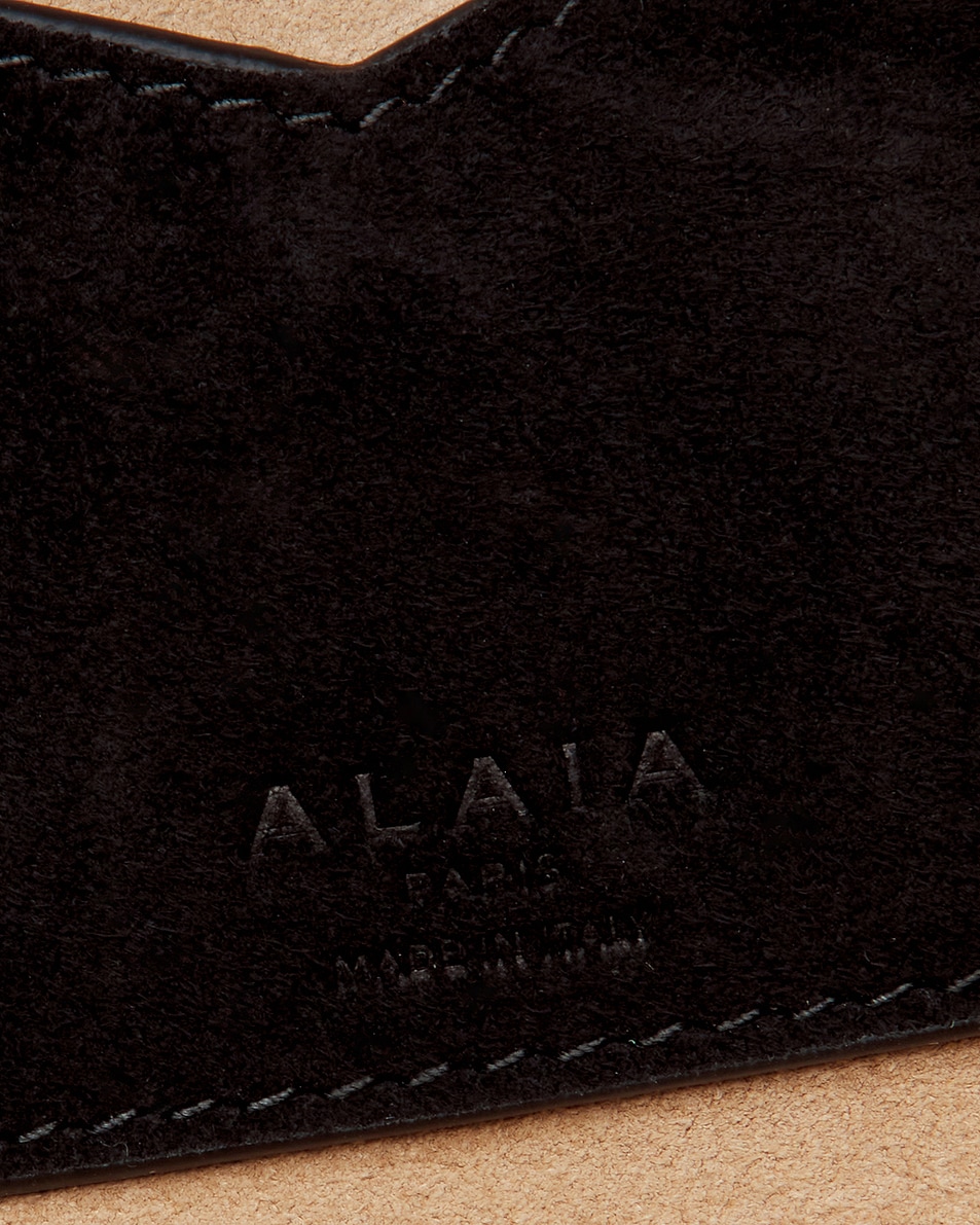 ALAÏA Teckel Clutch in Noir | FWRD