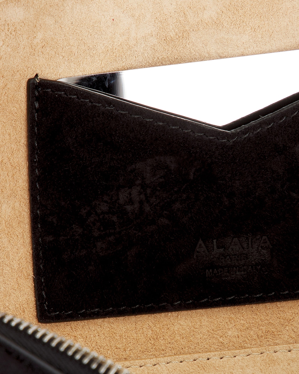 ALAÏA Teckel Clutch in Noir | FWRD