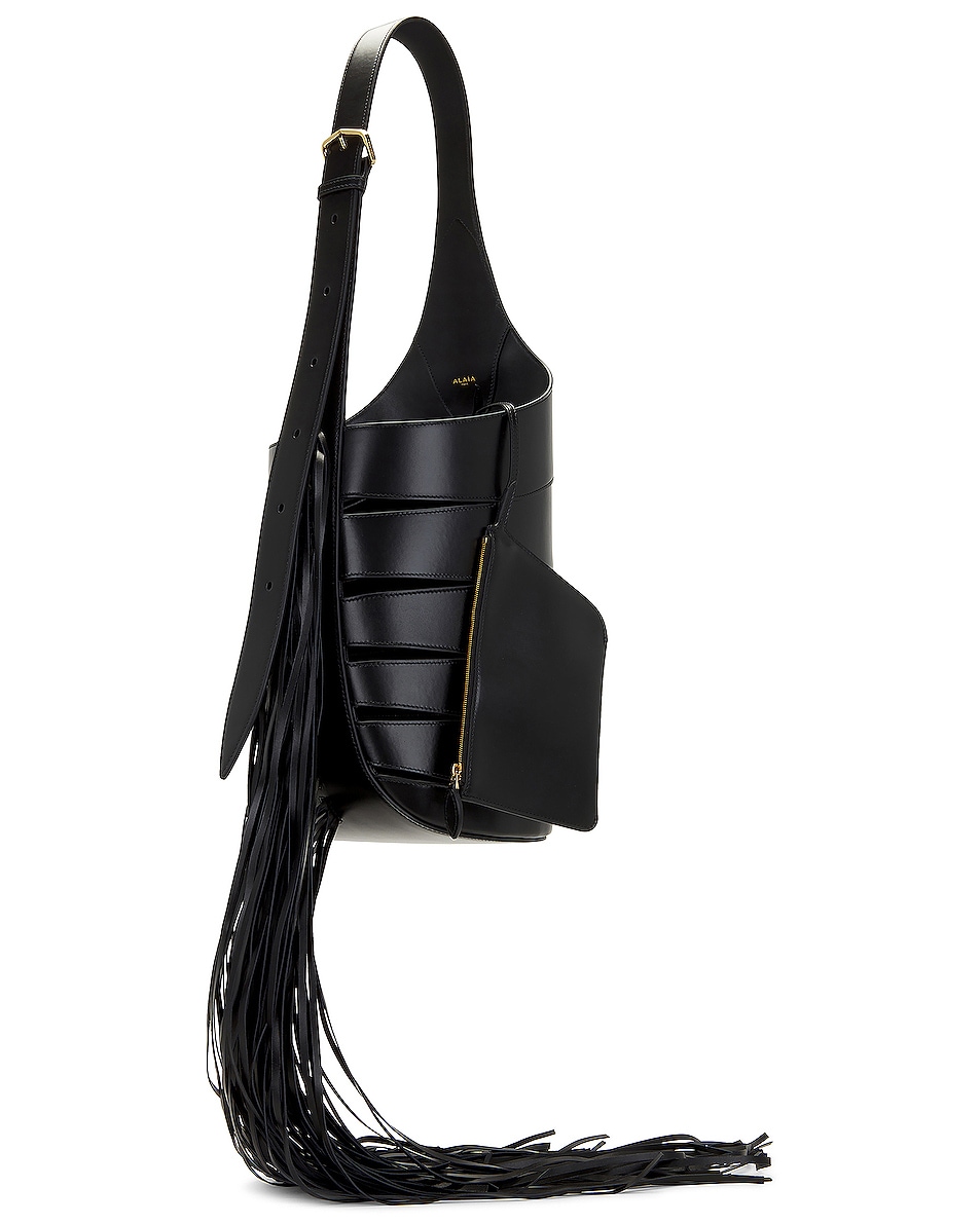 ALAÏA Medium Babel Fringe Hobo Bag in Noir | FWRD