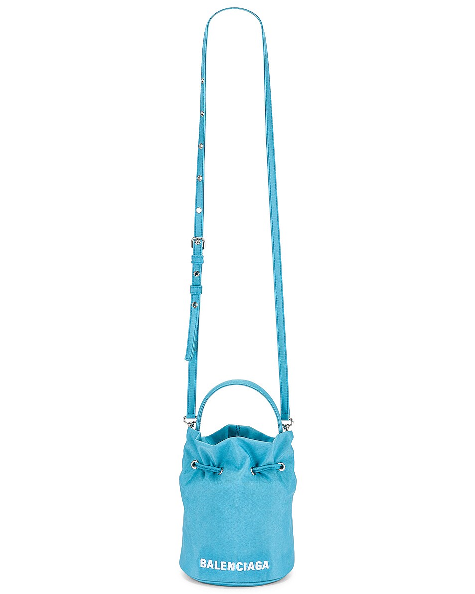 Balenciaga XS Wheel Drawstring Bucket Bag in Azur & White | FWRD