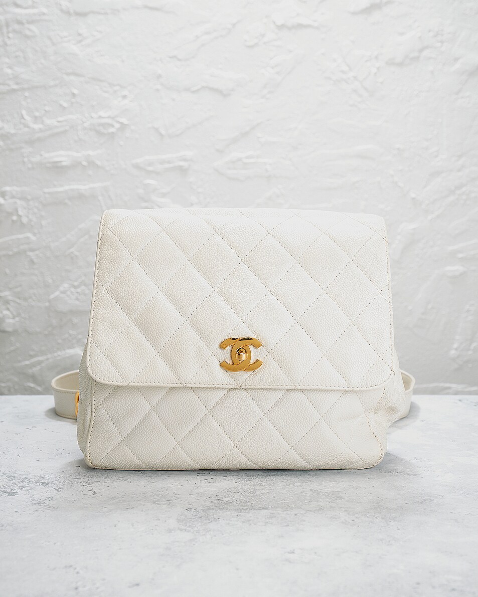 FWRD Renew Chanel 1996 Quilted Caviar CC Backpack in White | FWRD