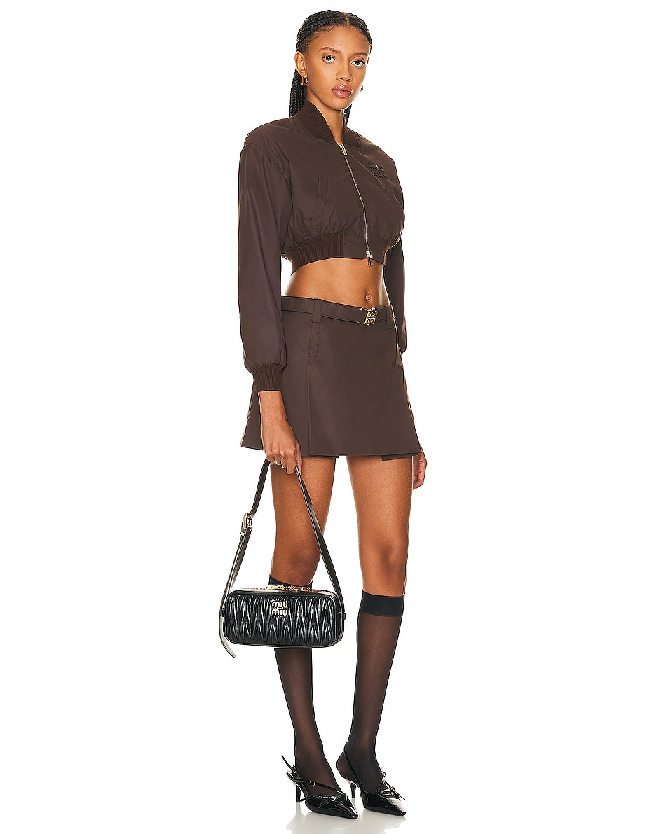 Miu Miu Matelasse Camera Handbag in Black | FWRD