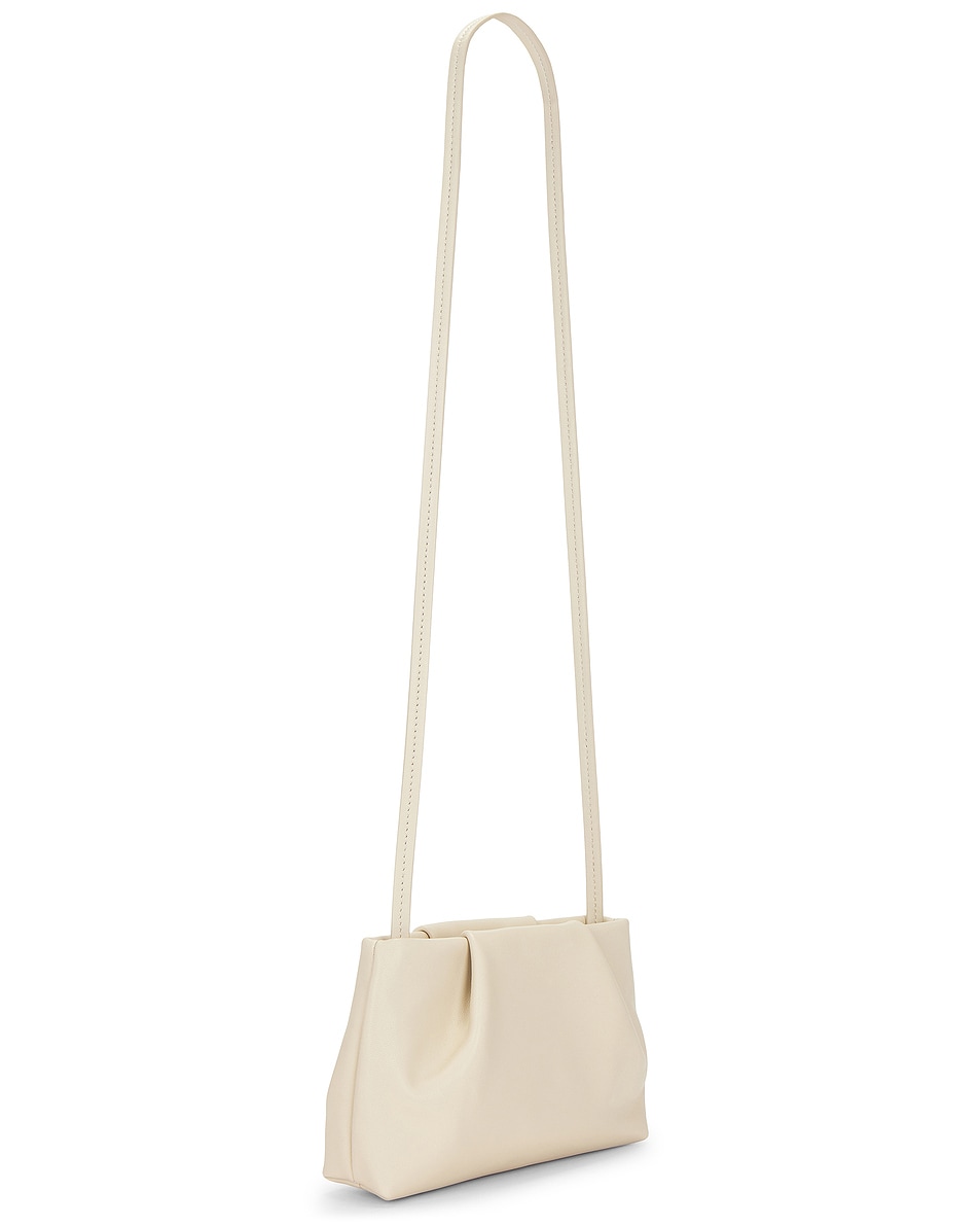 St. Agni Soft Tuck Sling Pouch Bag in Creme | FWRD