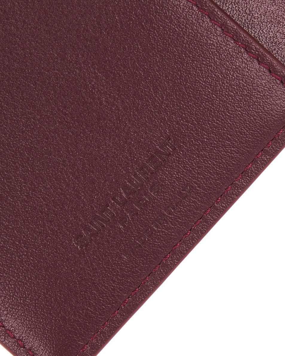 Saint Laurent Passport Holder in Red Grenat | FWRD