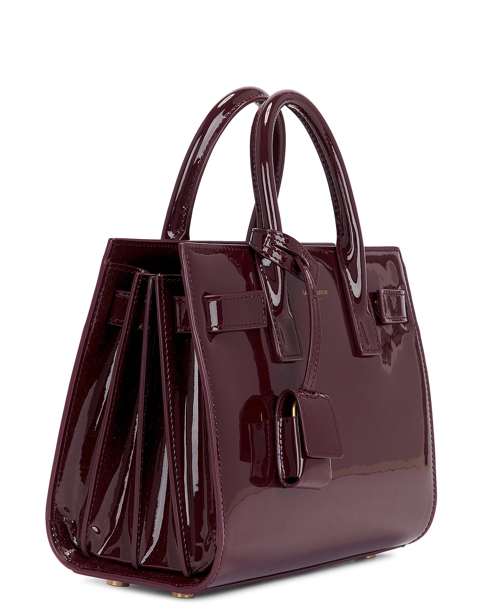 Saint Laurent Nano Sac De Jour Carryall Bag in Dark Red Wine | FWRD