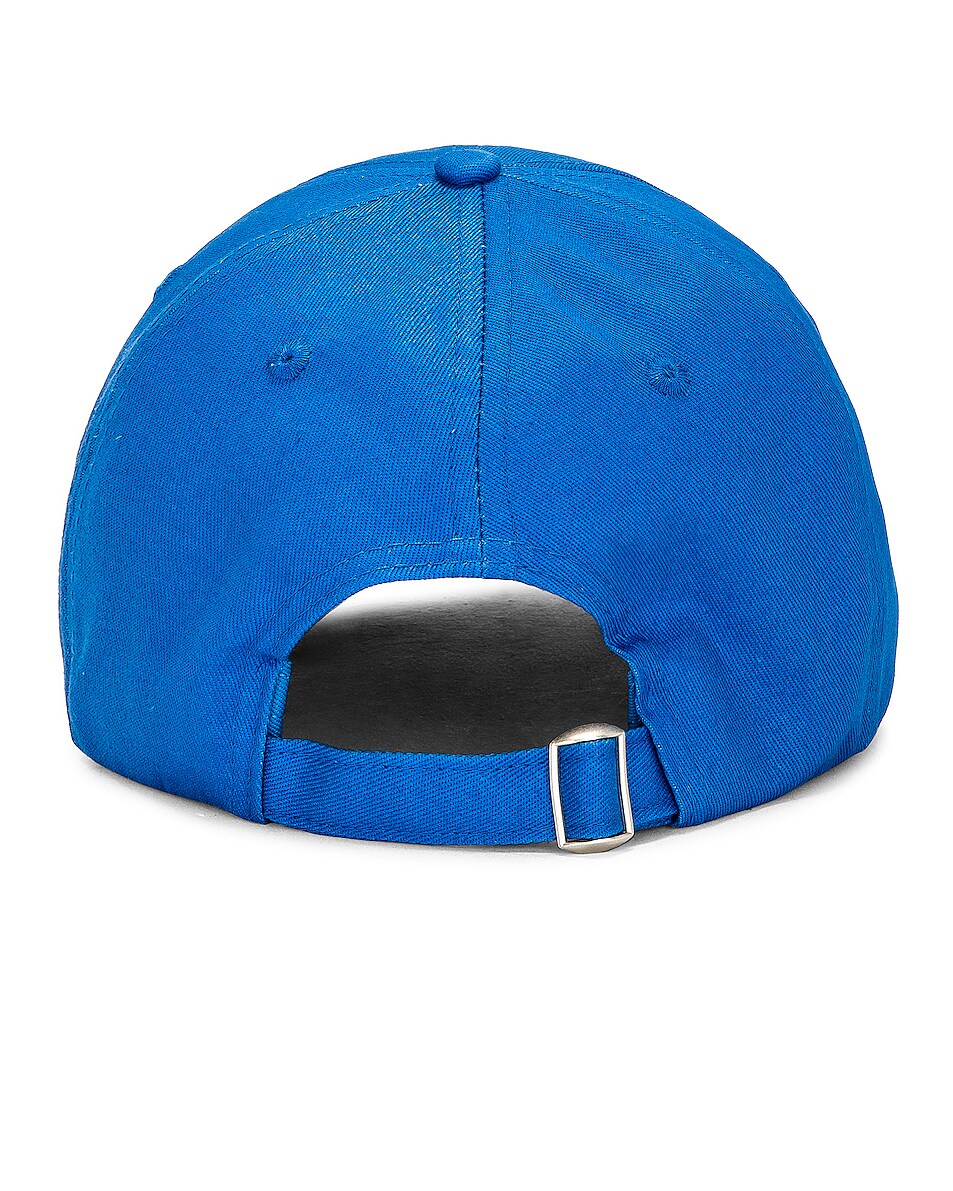 Sporty & Rich Cursive Logo Hat in Royal Blue & White | FWRD