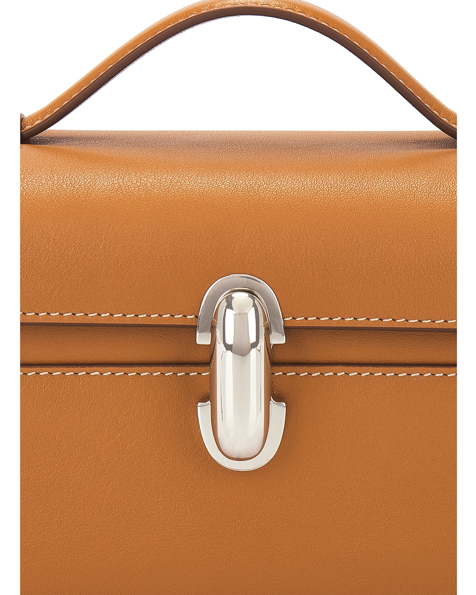 Savette The Symmetry Pochette Bag in Saddle | FWRD