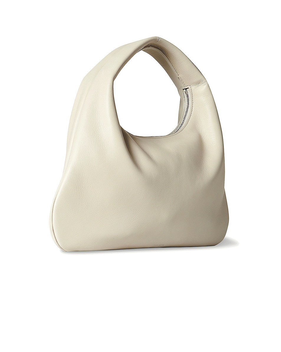 The Row Small Everyday Grain Leather Shoulder Bag in Ivory | FWRD