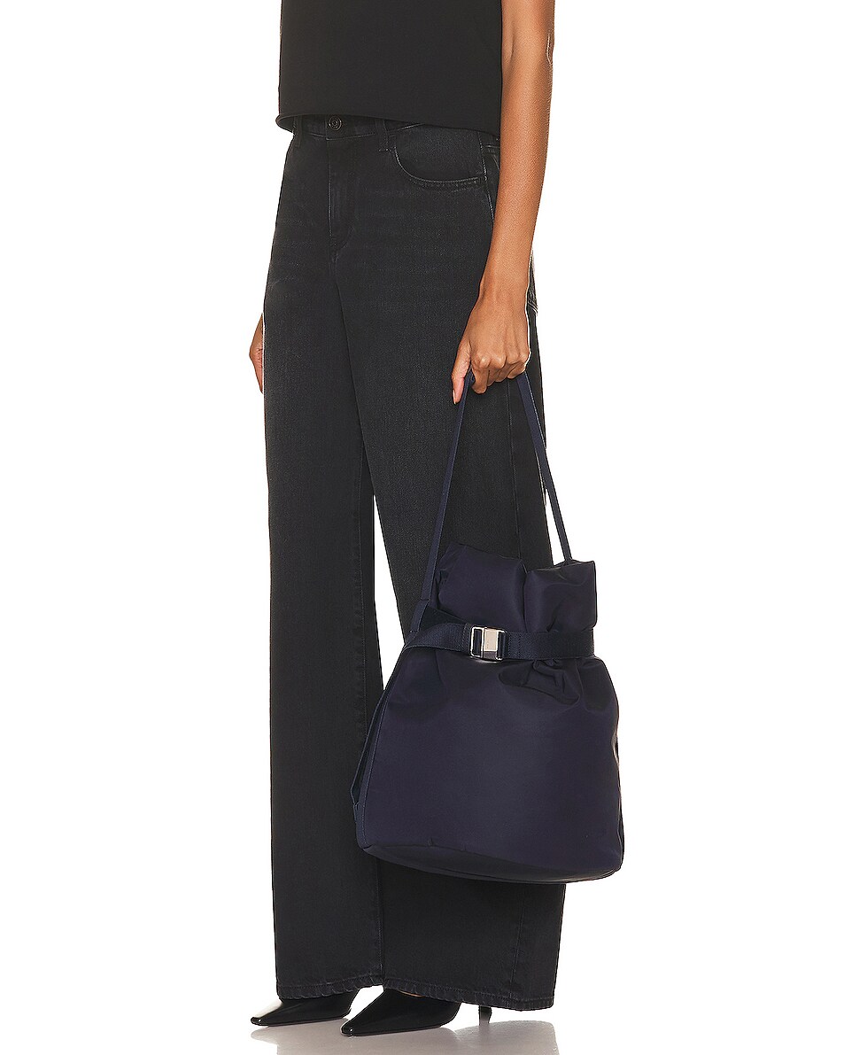 The Row Sporty Leo Bag in Dark Navy | FWRD
