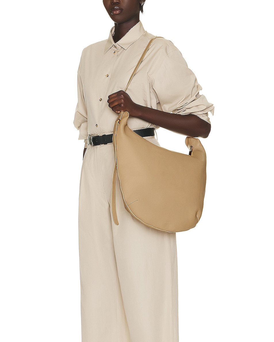 The Row Allie Hobo Bag in Dune | FWRD