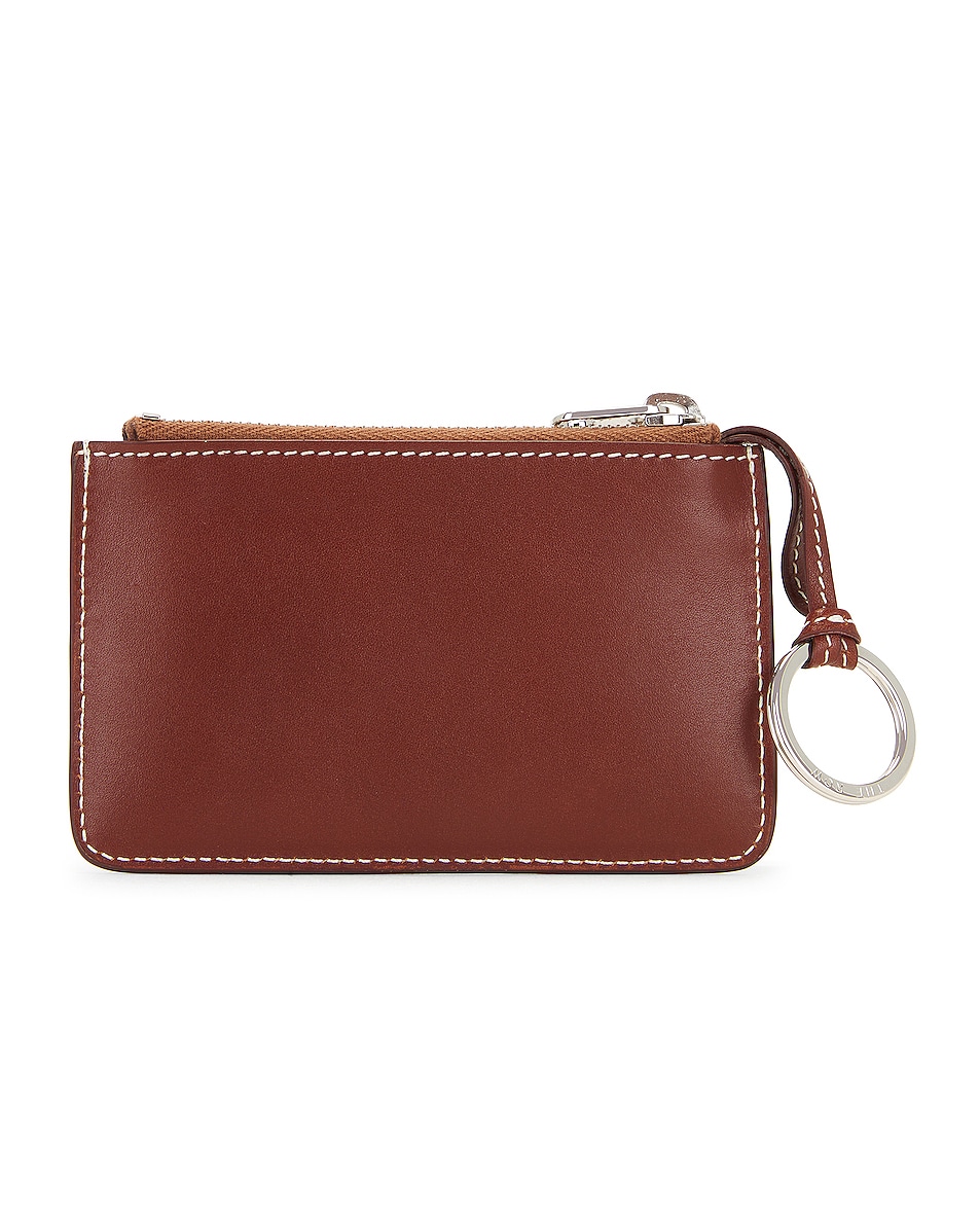 The Row Zipped Keychain Pouch in Cherry Wood PLD | FWRD