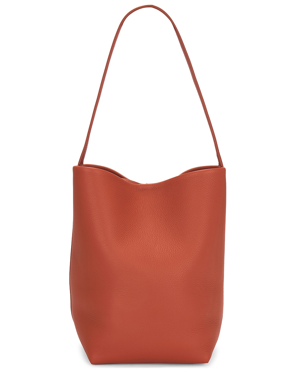 The Row Medium N/S Park Tote Bag in Rust PLD | FWRD