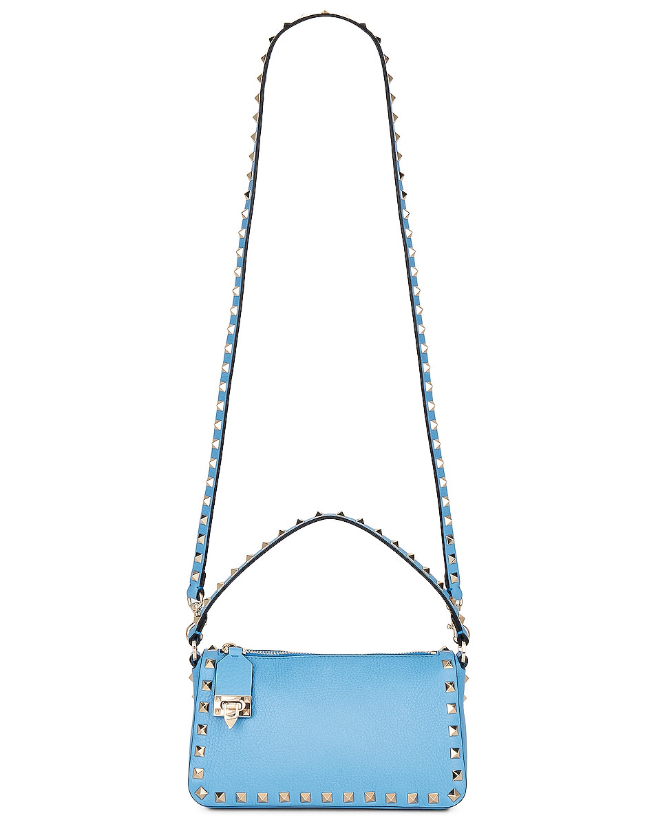 Valentino Garavani Small Rockstud Shoulder Bag in Denim | FWRD