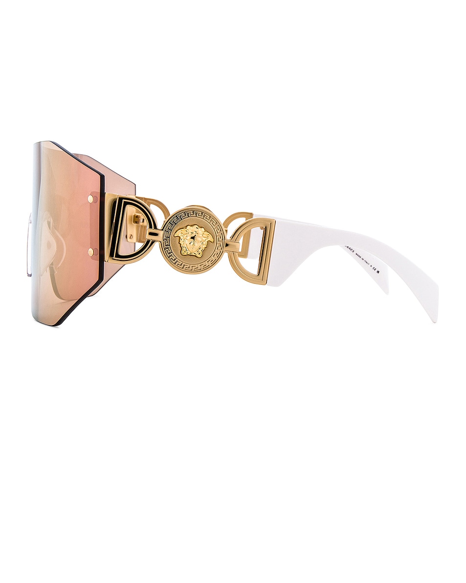 VERSACE Shield Sunglasses in Gold | FWRD