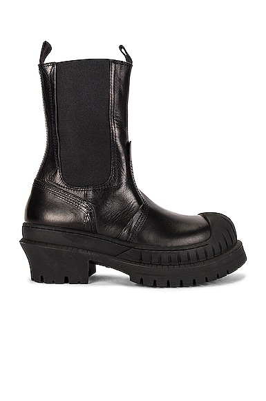 Acne Studios Lug Boot in Black & Black | FWRD