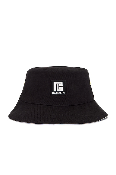 BALMAIN Reversible Patch Bucket Hat in Noir & Blanc | FWRD