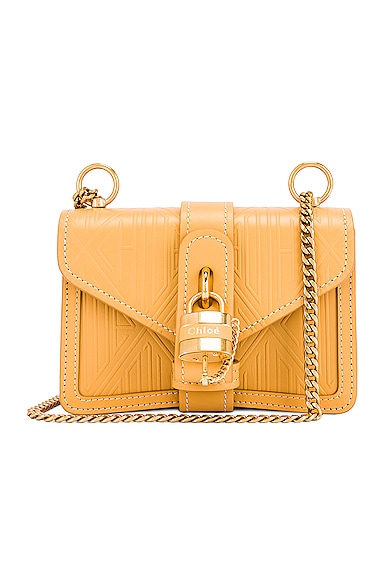 Chloe Mini Aby Chain Embossed Monogram Shoulder Bag in Honey Gold | FWRD