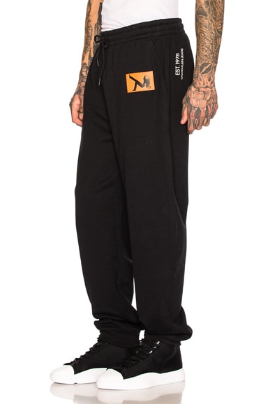 Calvin Klein Est. 1978 Icon Sweatpants in Black & Orange | FWRD