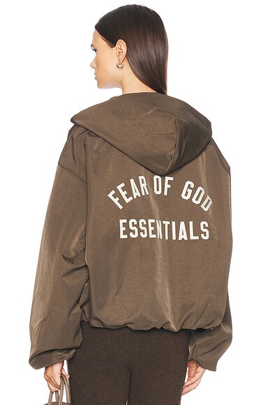 Fear of God ESSENTIALS Hooded Bomber Jacket in Brown | FWRD