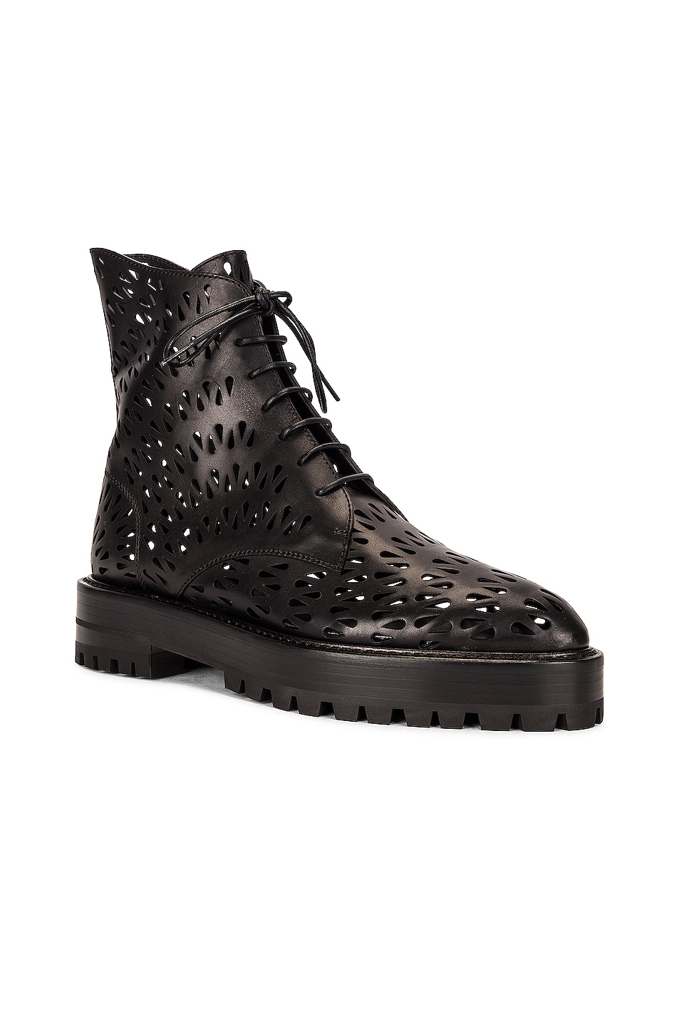 ALAÏA Leather Laser Cut Boots in Noir | FWRD