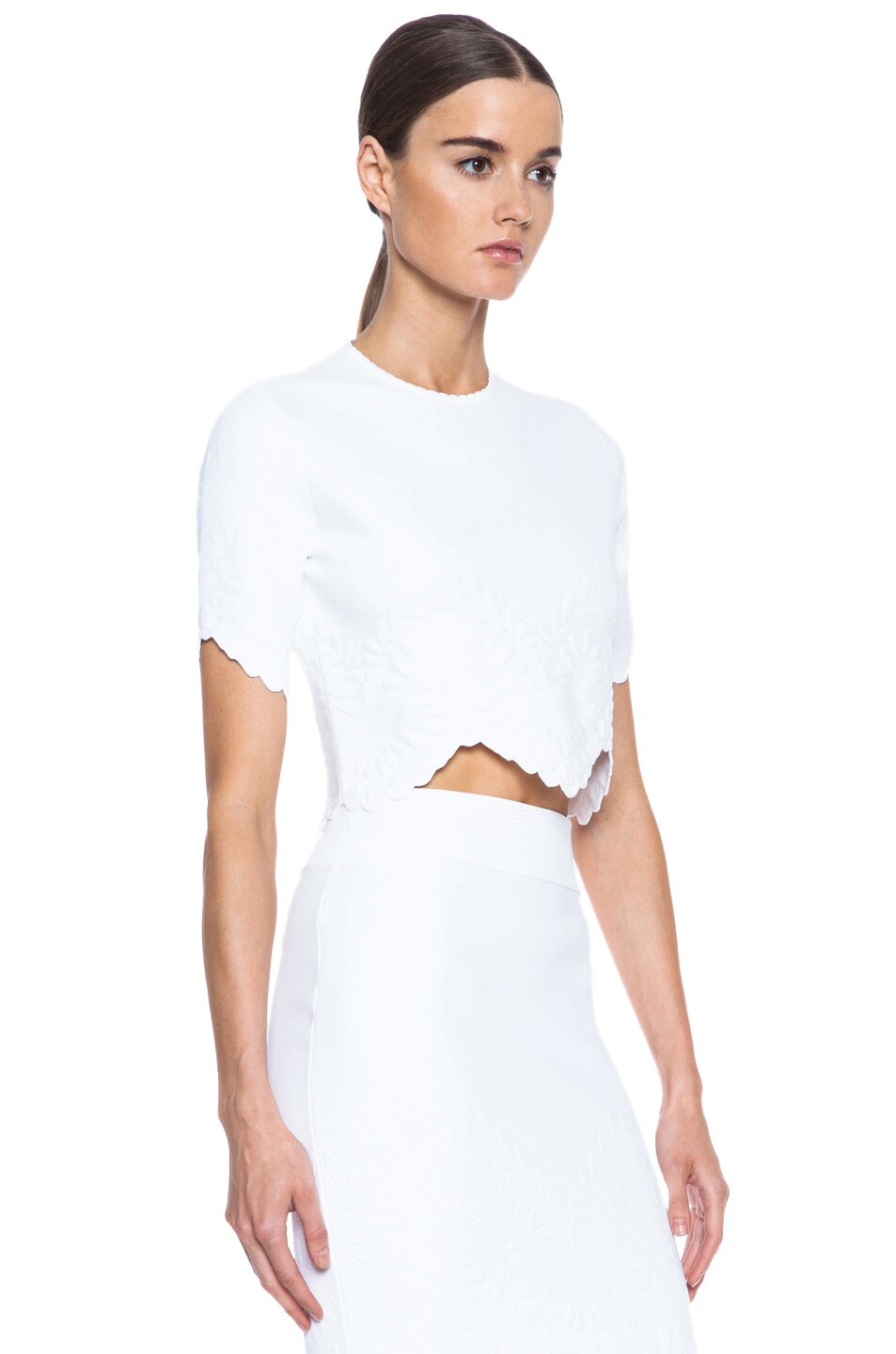 McQueen Embossed Knit Crop Top in White | FWRD