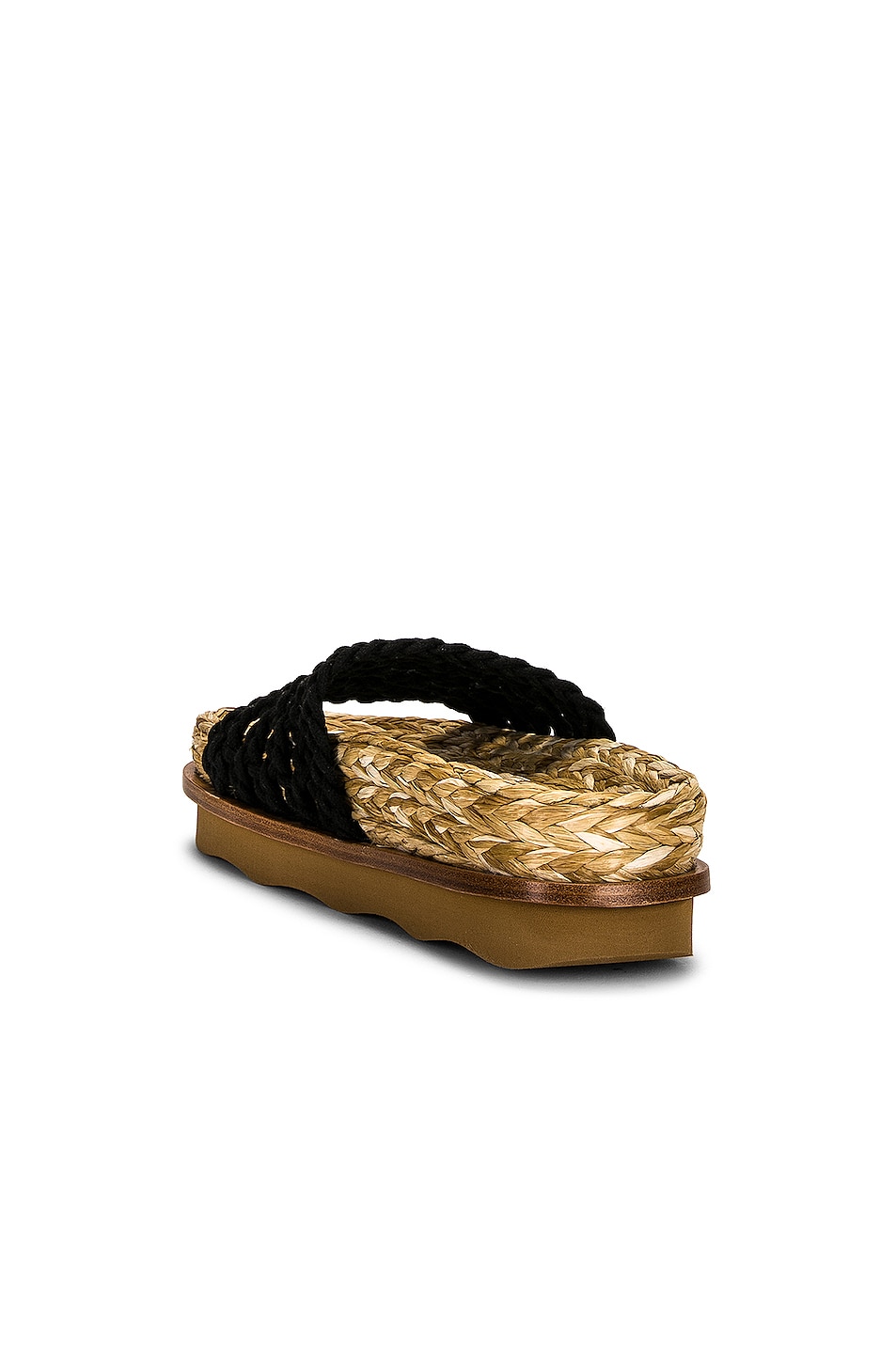 Chloe Wavy Flat Mules in Black | FWRD