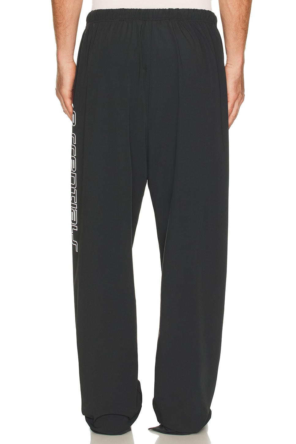 Fear of God ESSENTIALS Relaxed Track Pant in Vintage Black | FWRD