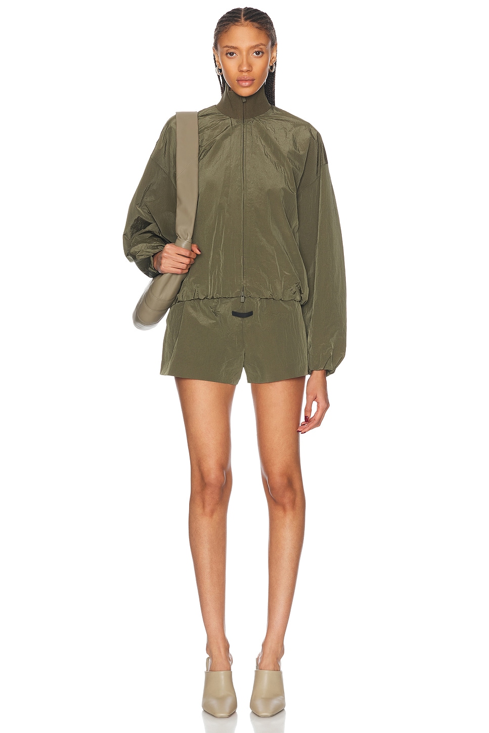Fear of God ESSENTIALS Track Jacket in Military | FWRD