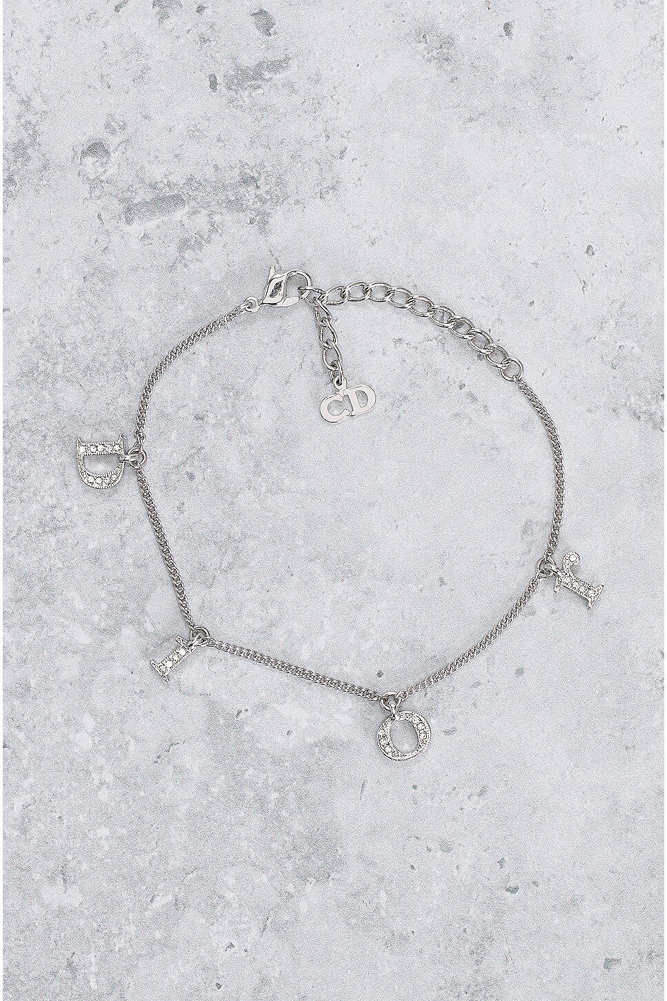 FWRD Renew Dior Rhinestone Logo Bracelet in Silver | FWRD