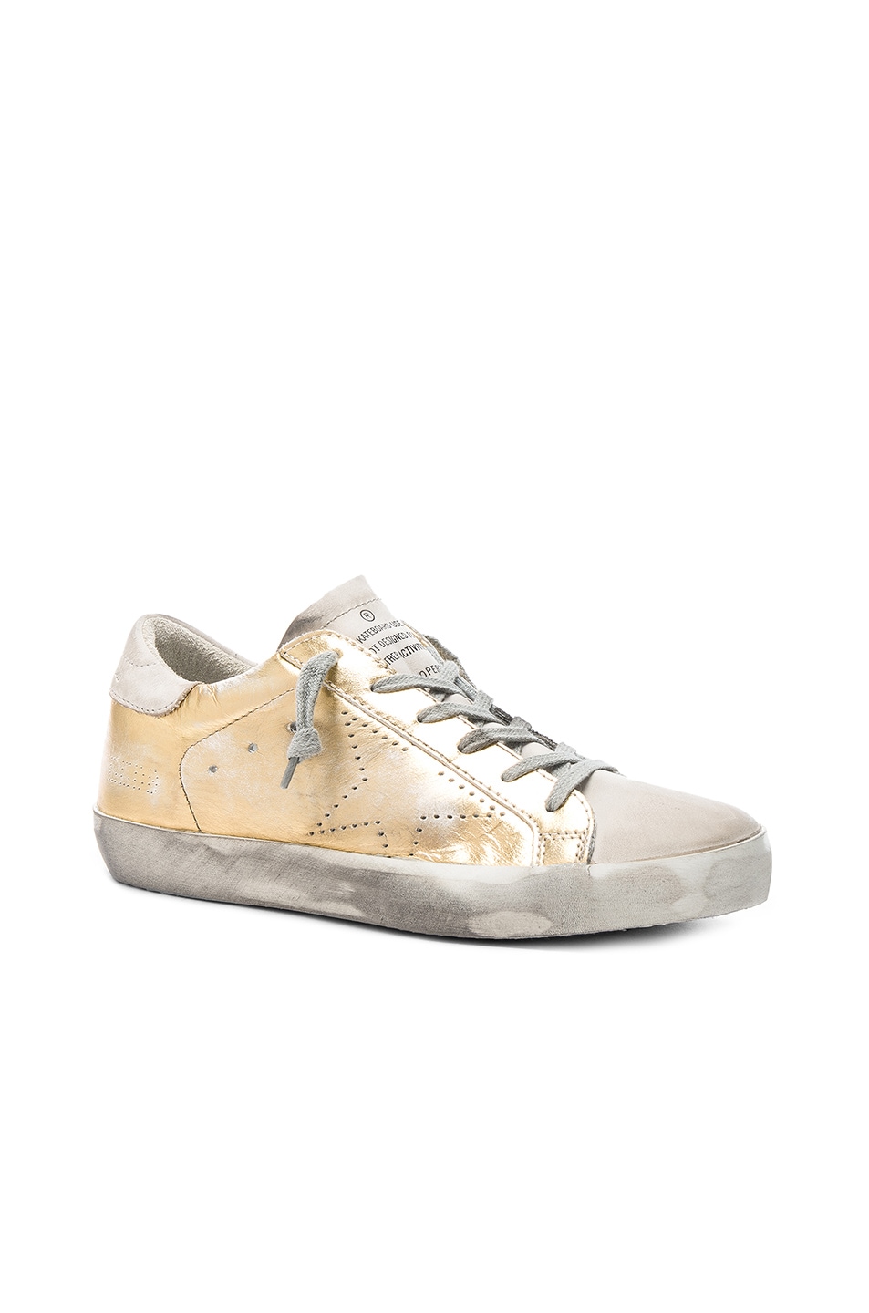 Golden Goose Superstar Sneakers in Gold | FWRD