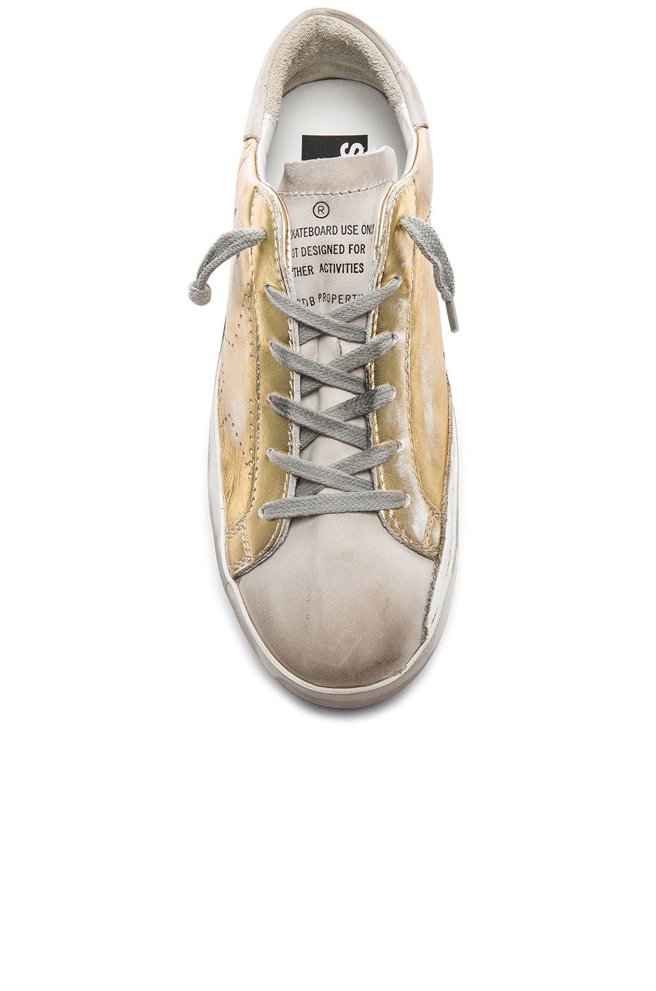 Golden Goose Superstar Sneakers in Gold | FWRD