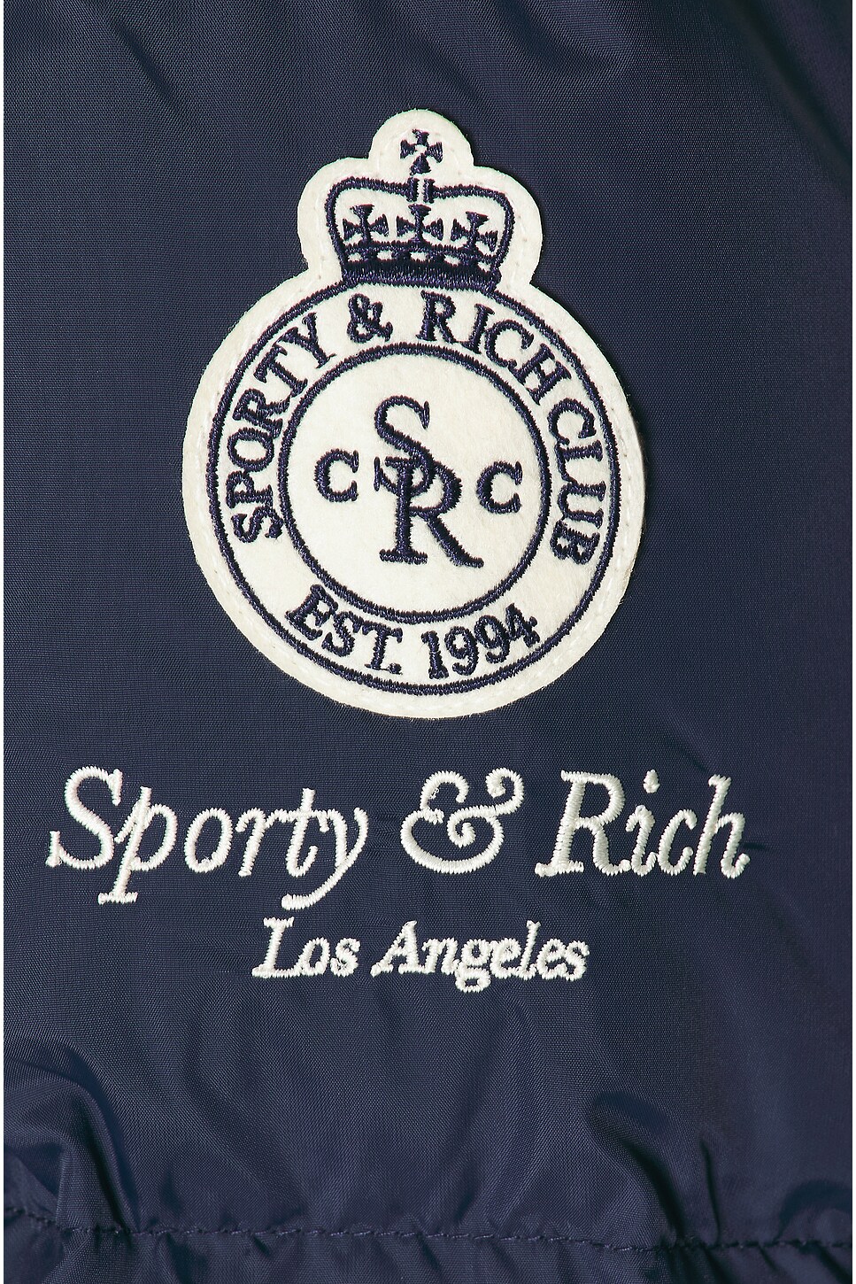 Sporty & Rich Crown LA Puffer Jacket in Navy & Cream | FWRD