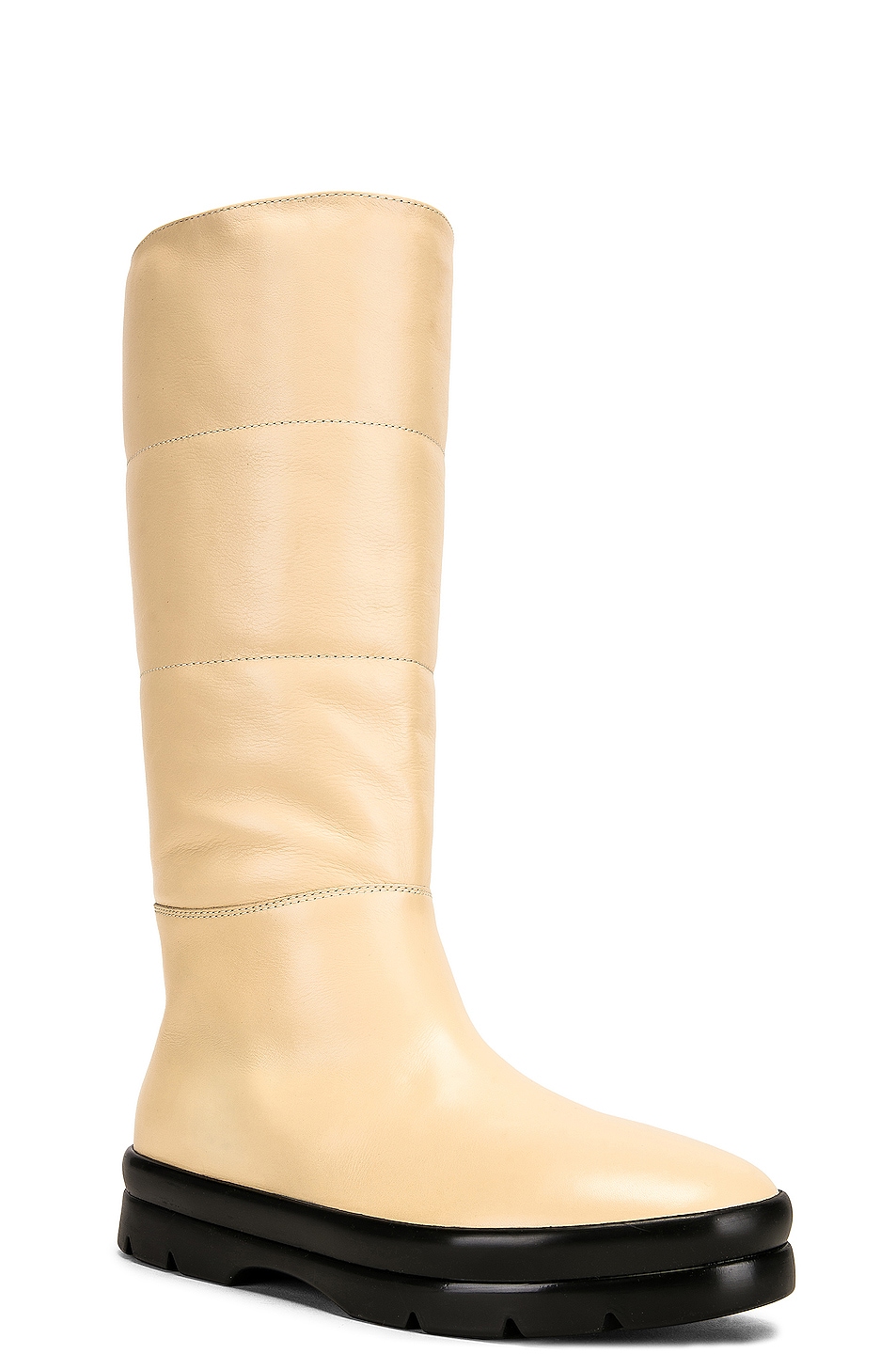 The Row Puffy Boots in Eggshell & Navy | FWRD