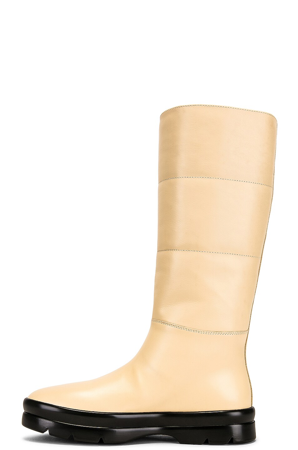 The Row Puffy Boots in Eggshell & Navy | FWRD